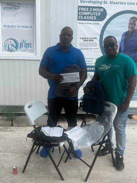 St. Martin News Network - Rollocks Jr, donates School Supplies.